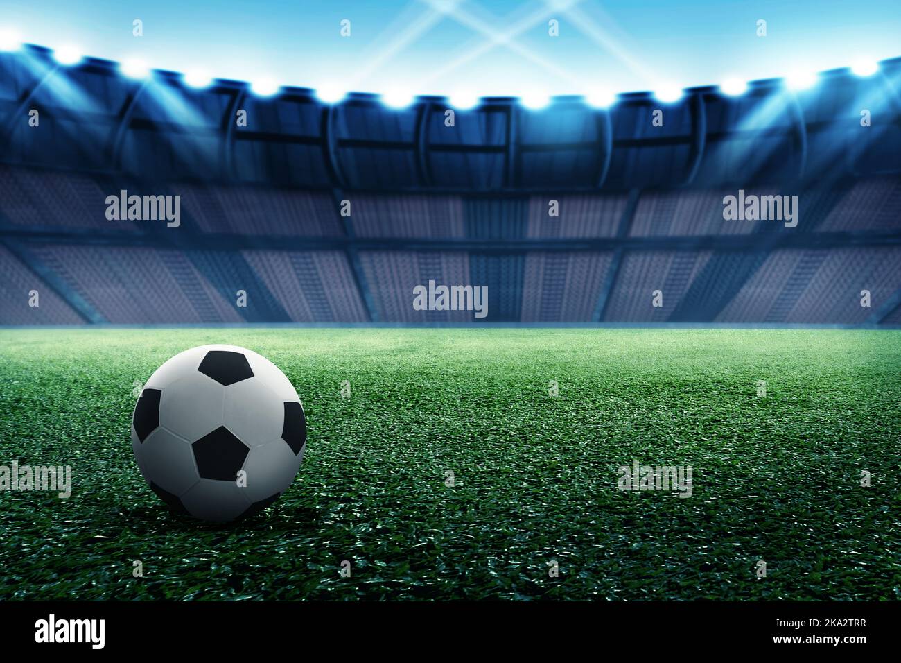 Ball on the grass inside the football stadium Stock Photo - Alamy
