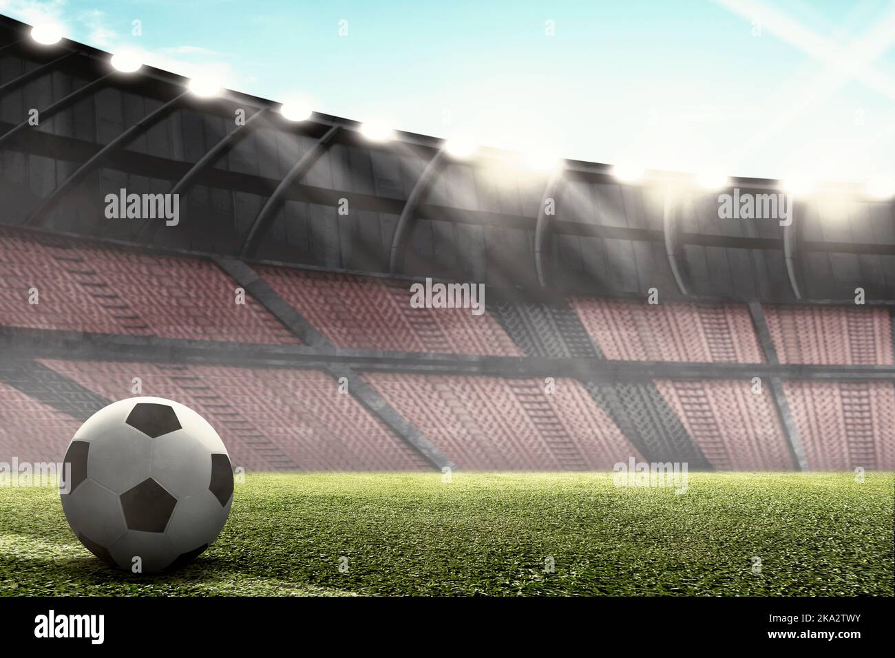 Ball on the grass inside the football stadium Stock Photo - Alamy