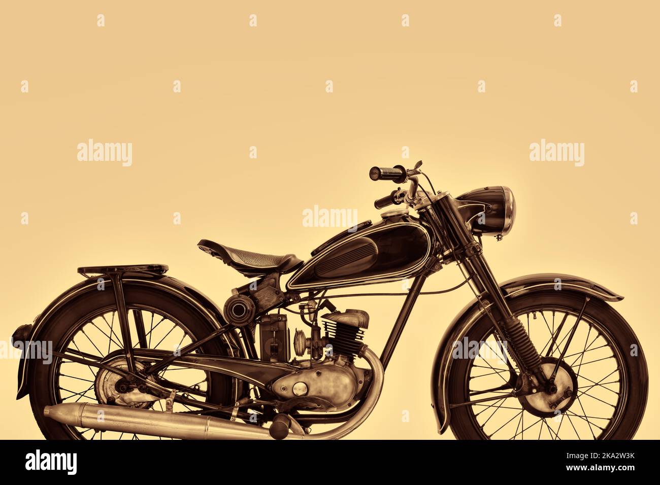 Sepia toned side view image of a vintage motorcycle Stock Photo - Alamy