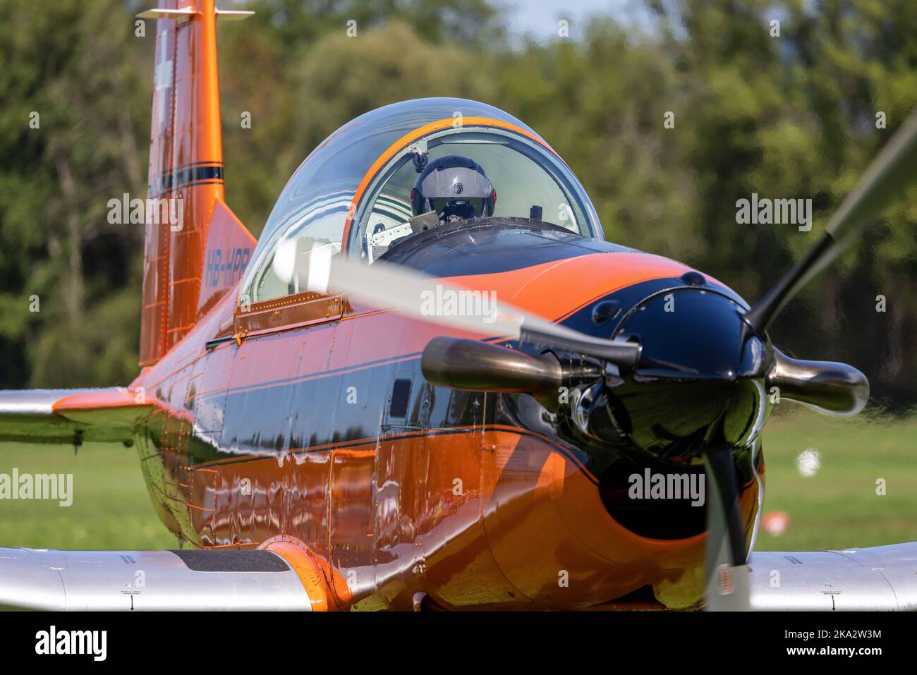 A view of the Pilatus PC-7 aircraft on the ground before the trees in ...