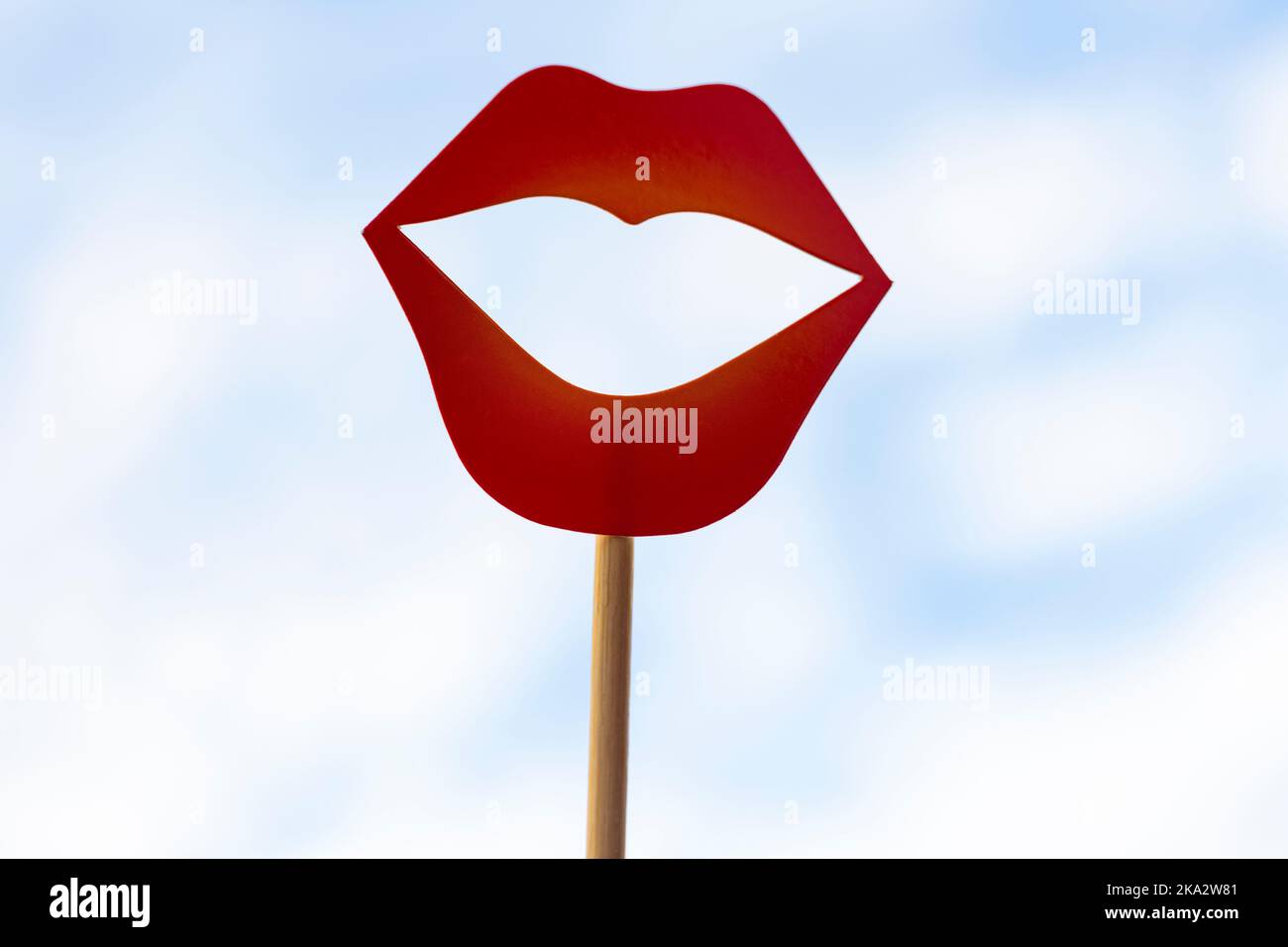 close up view of a red paper lips photo booth props Stock Photo - Alamy