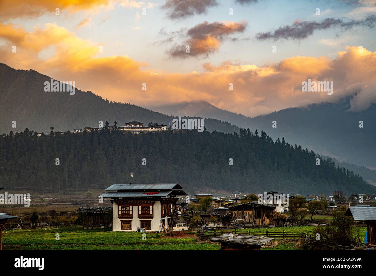 An aerial view of a historic building in the mountains of Bhutan, Nepal ...