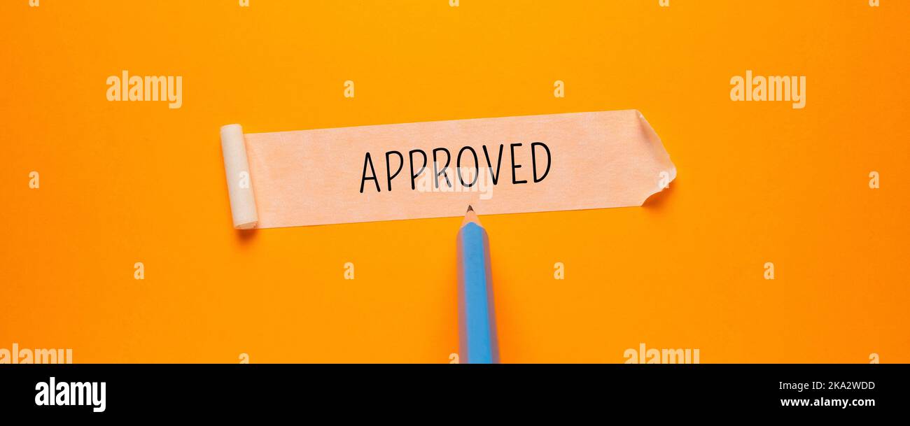 Close up conceptual shot of a business idea showing Approved Stock ...