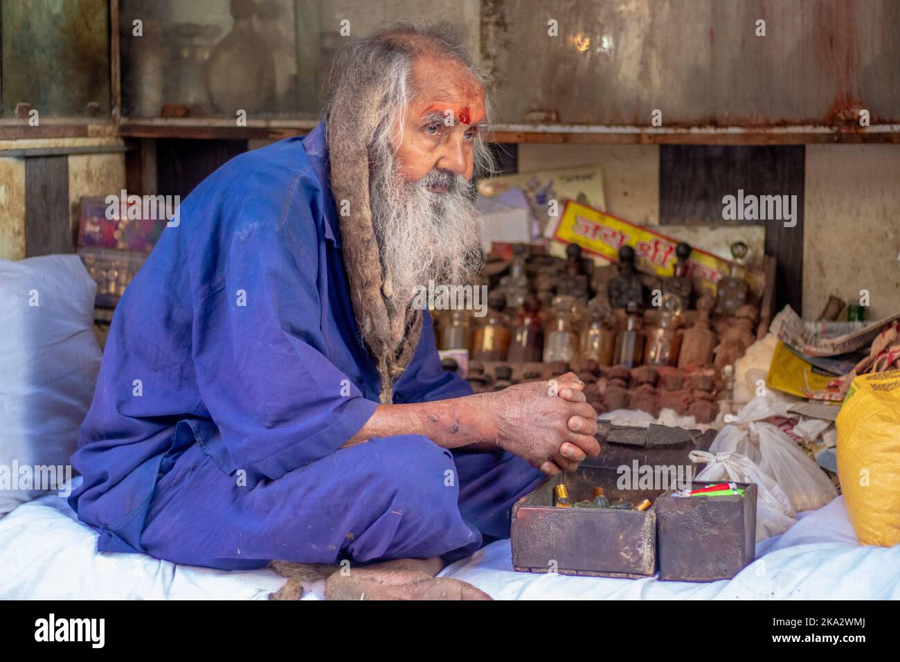 A portrait of Sadhu with long hair and a beard Stock Photo - Alamy