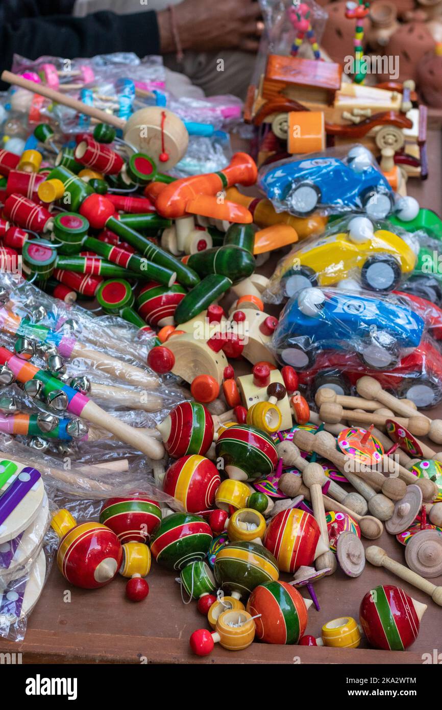 A vertical shot of wooden toys in a local street market in India Stock ...