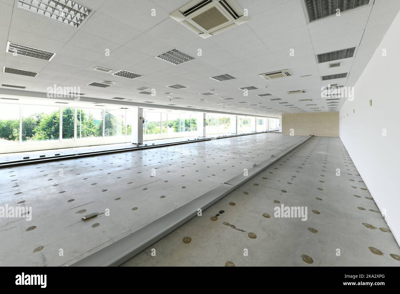tall office building with large window and awaiting renovation Stock ...