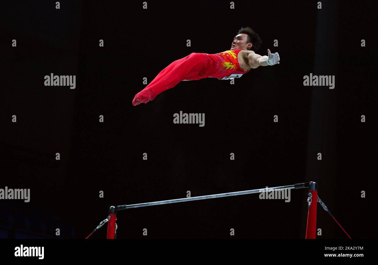 China's Wei Sun competes on the high bar during day three of the FIG ...