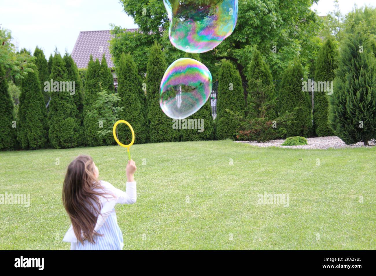 Iridescent giant bubbles hi-res stock photography and images - Alamy