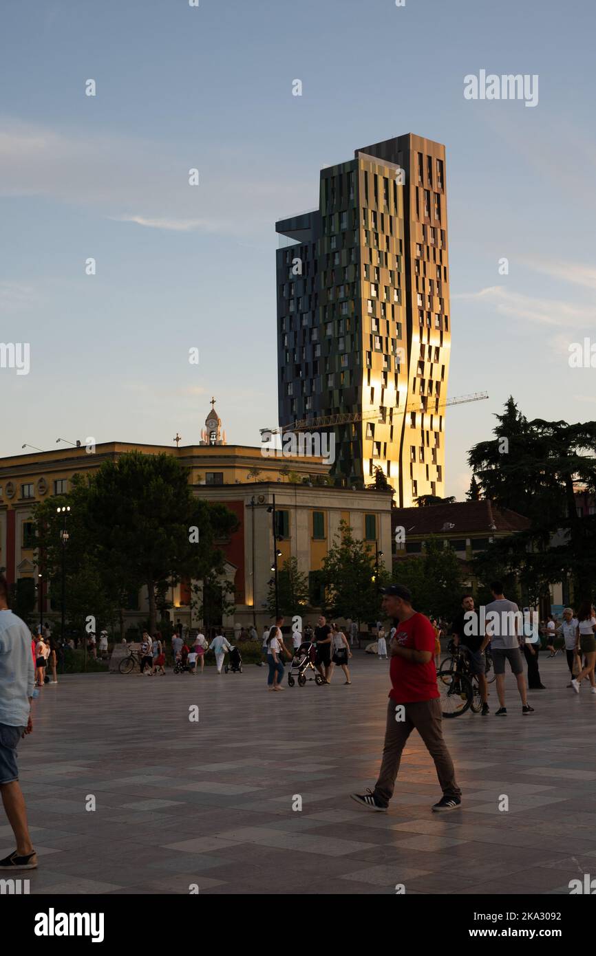 A vertical shot of the crowded Skanderberg square in Tirana, Albania at ...