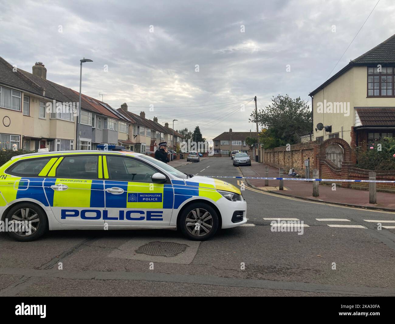Police at the scene in Auriel Avenue, Dagenham where one woman died and ...