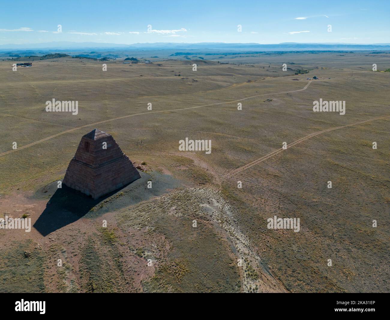 A top view of Ames Monument in the middle of the field under blue sky ...