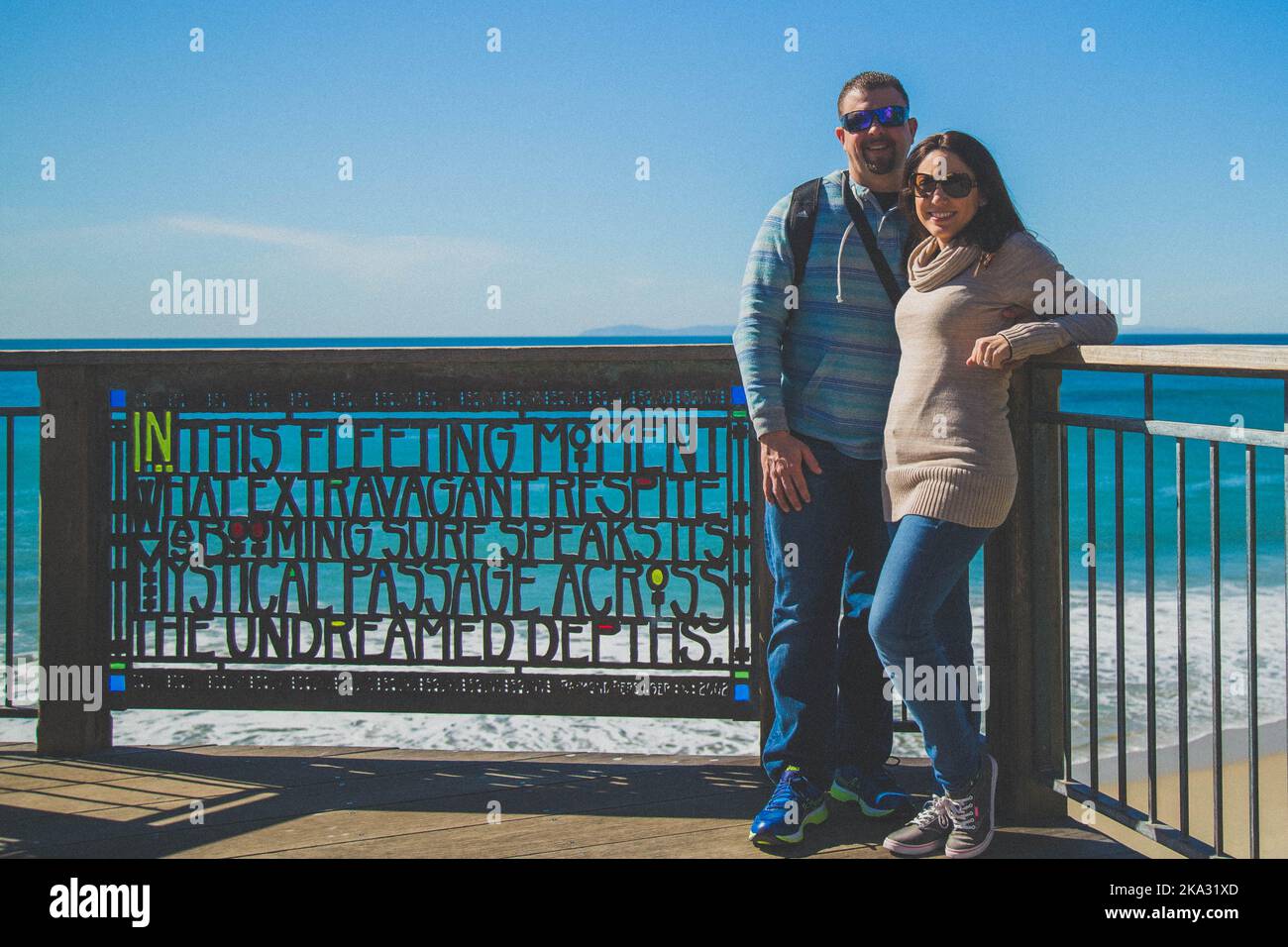 A couple posing in front of a statue in Laguna Beach, Southern ...