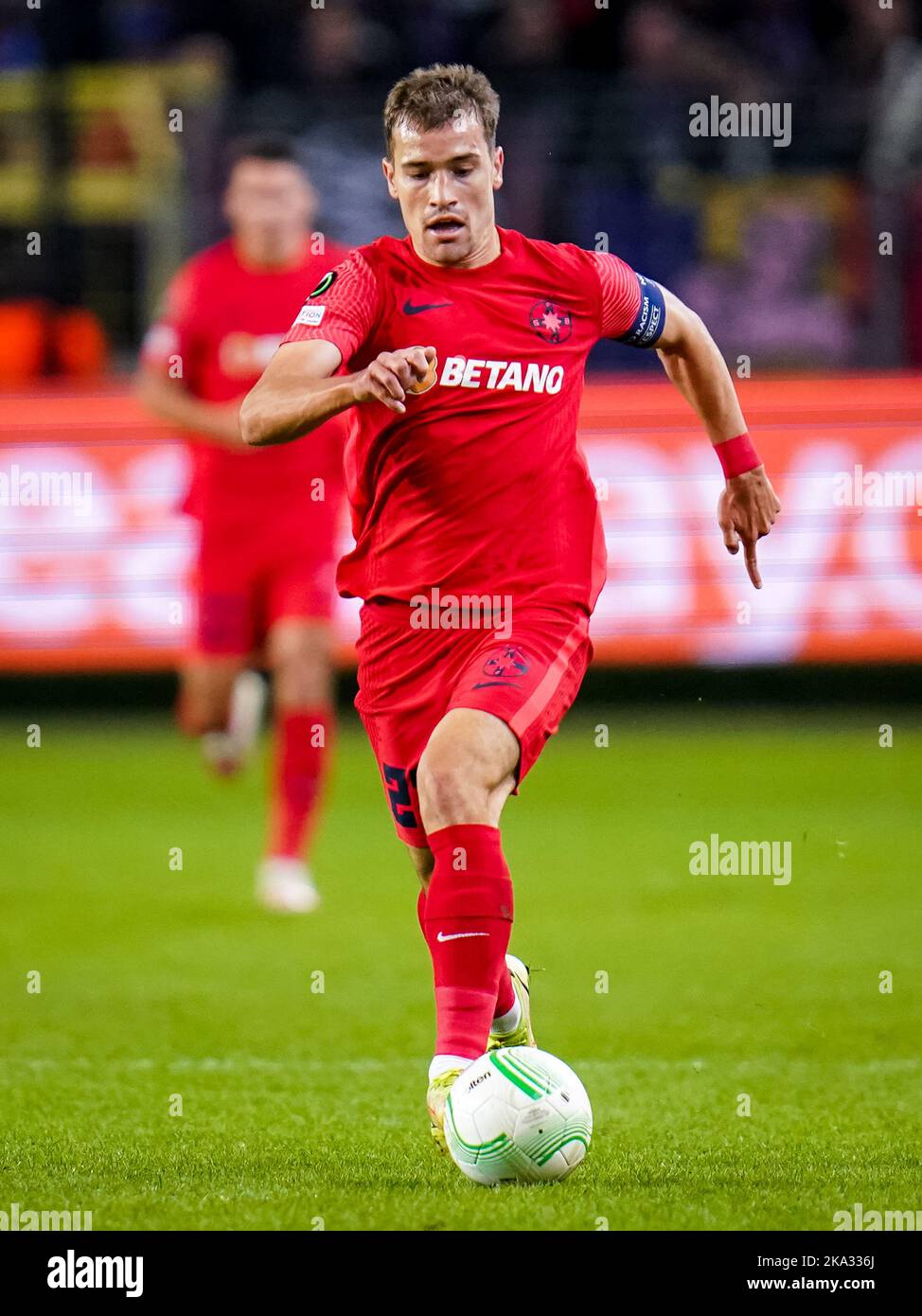 BRUSSELS, BELGIUM - OCTOBER 27: Darius Olaru of FCSB dribbles with the ...