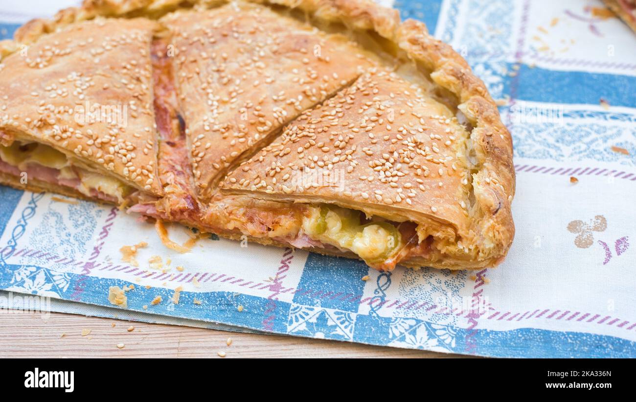 traditional pie, covered pizza baked in wood with wood Stock Photo - Alamy