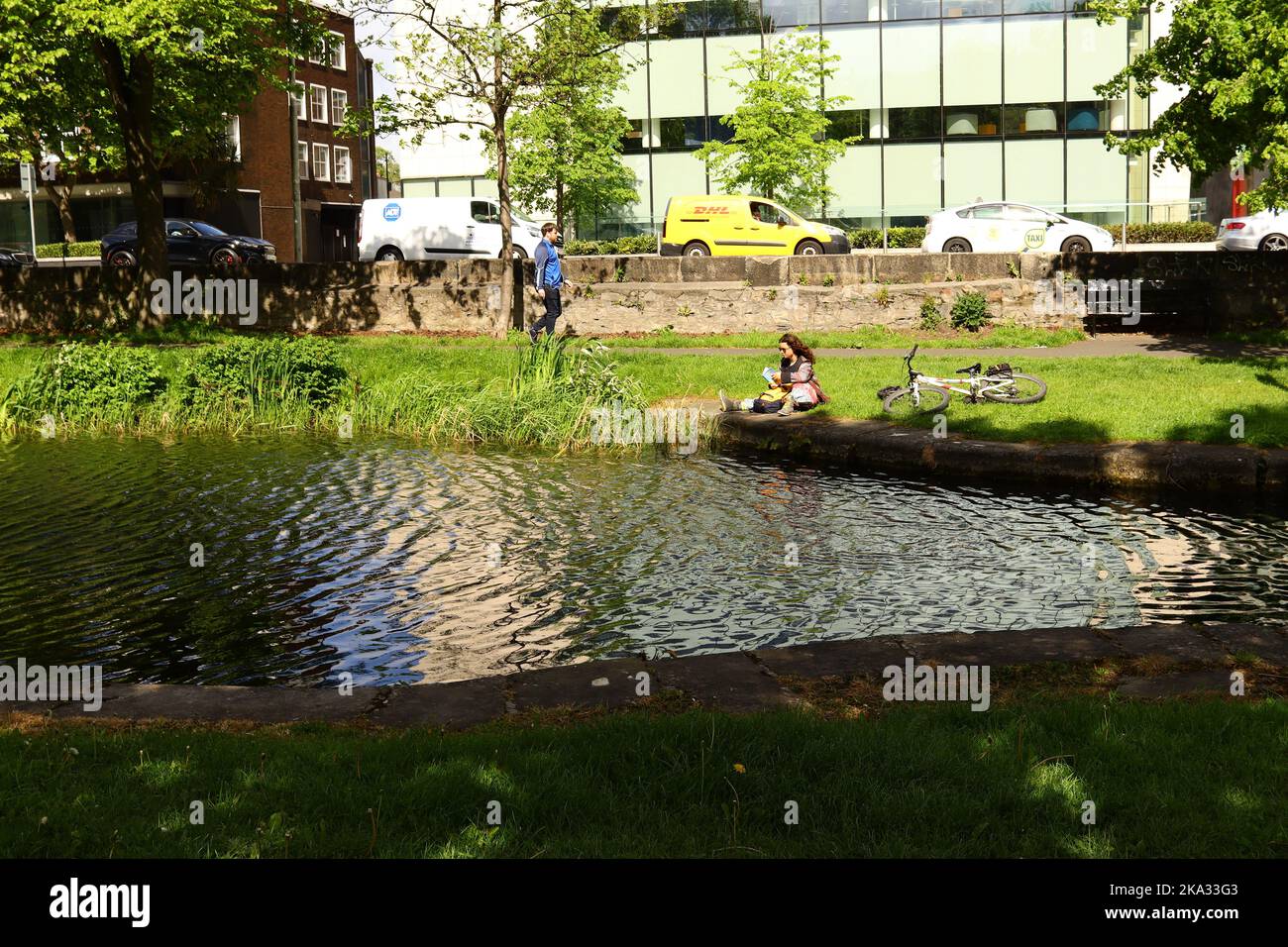 Spring day at the Grand Canal, Dublin Ireland with calm water and ...