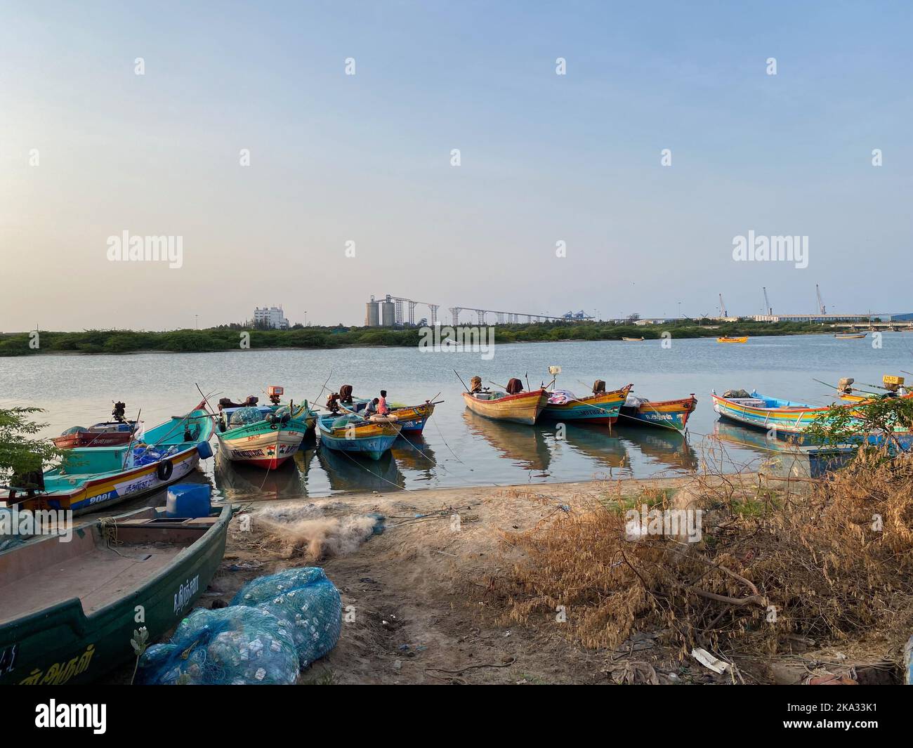 A line of fishing boats near the seashore Stock Photo - Alamy