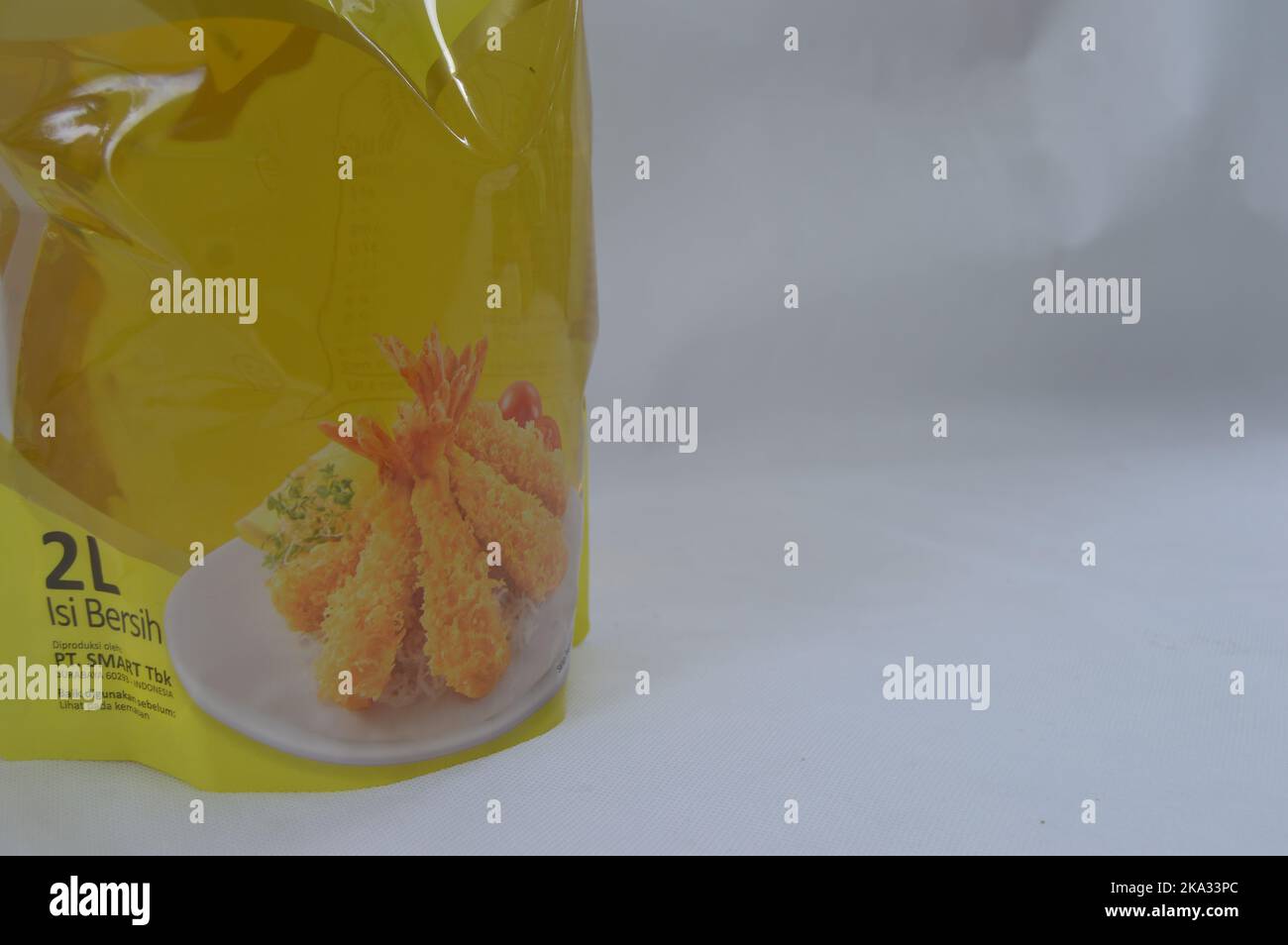 Filma packaged cooking oil on a white background Stock Photo - Alamy