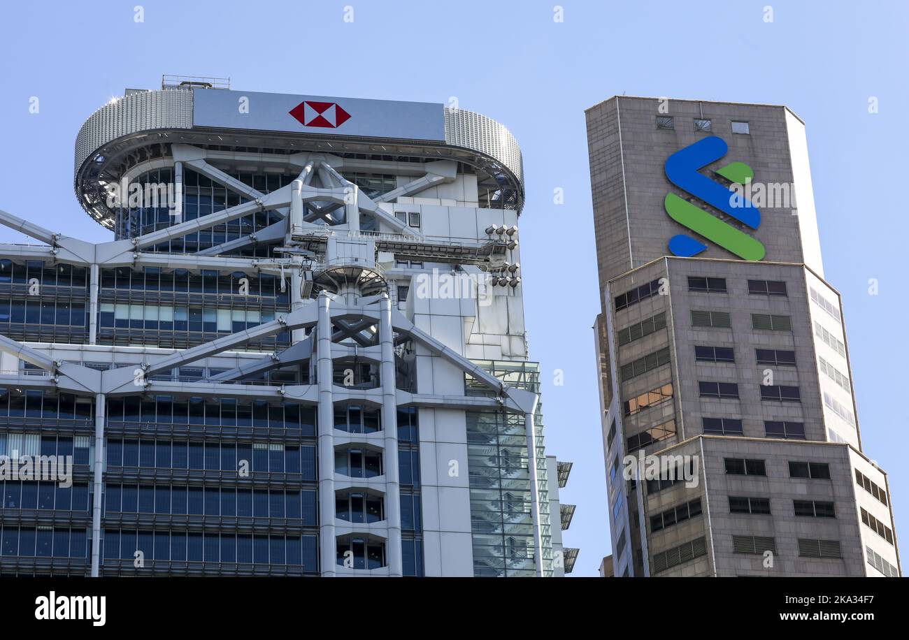(L-R) The Headquarters buildings of HSBC and Standard Chartered Bank ...