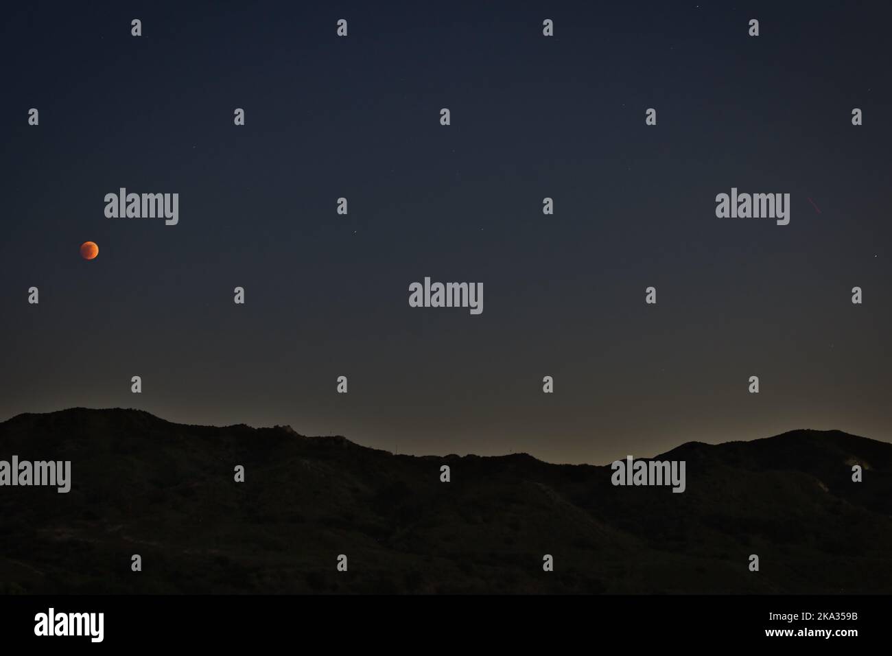 A mysterious view of a night sky with red moon in Los Angeles ...