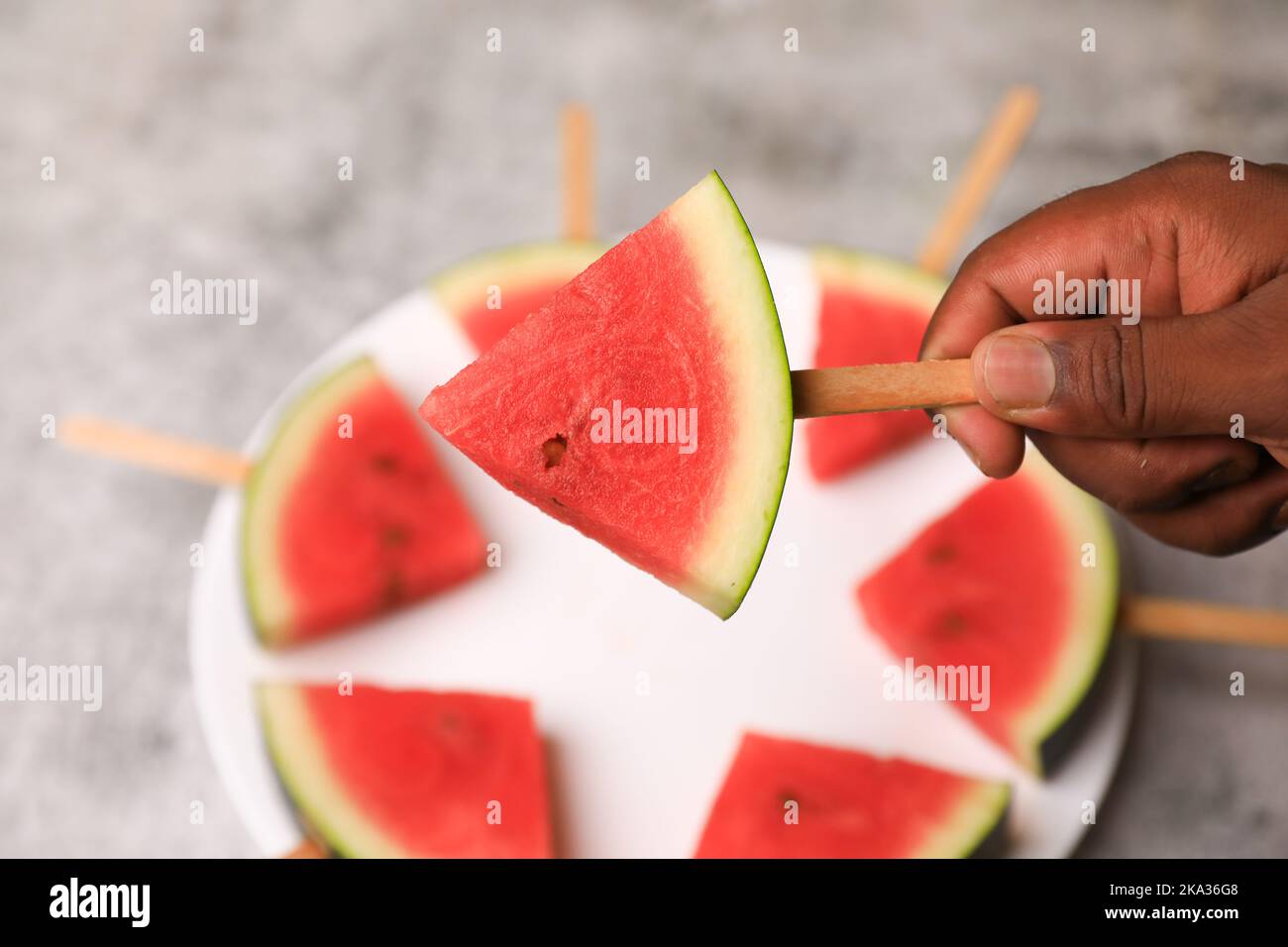 Watermelon cut into popsicle shapes Stock Photo - Alamy