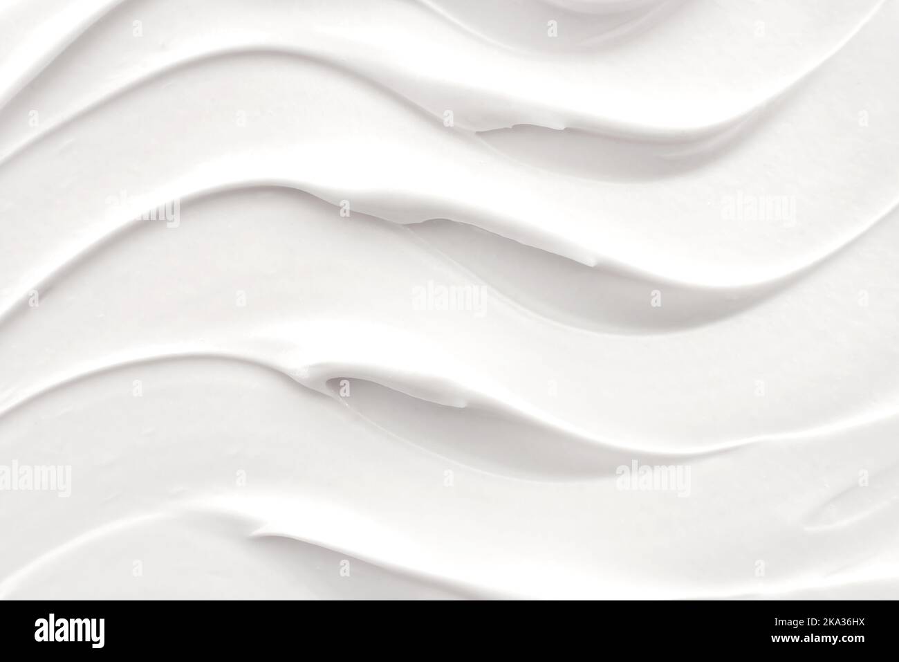 Texture of white face cream is smeared. Cosmetic products for makeup ...