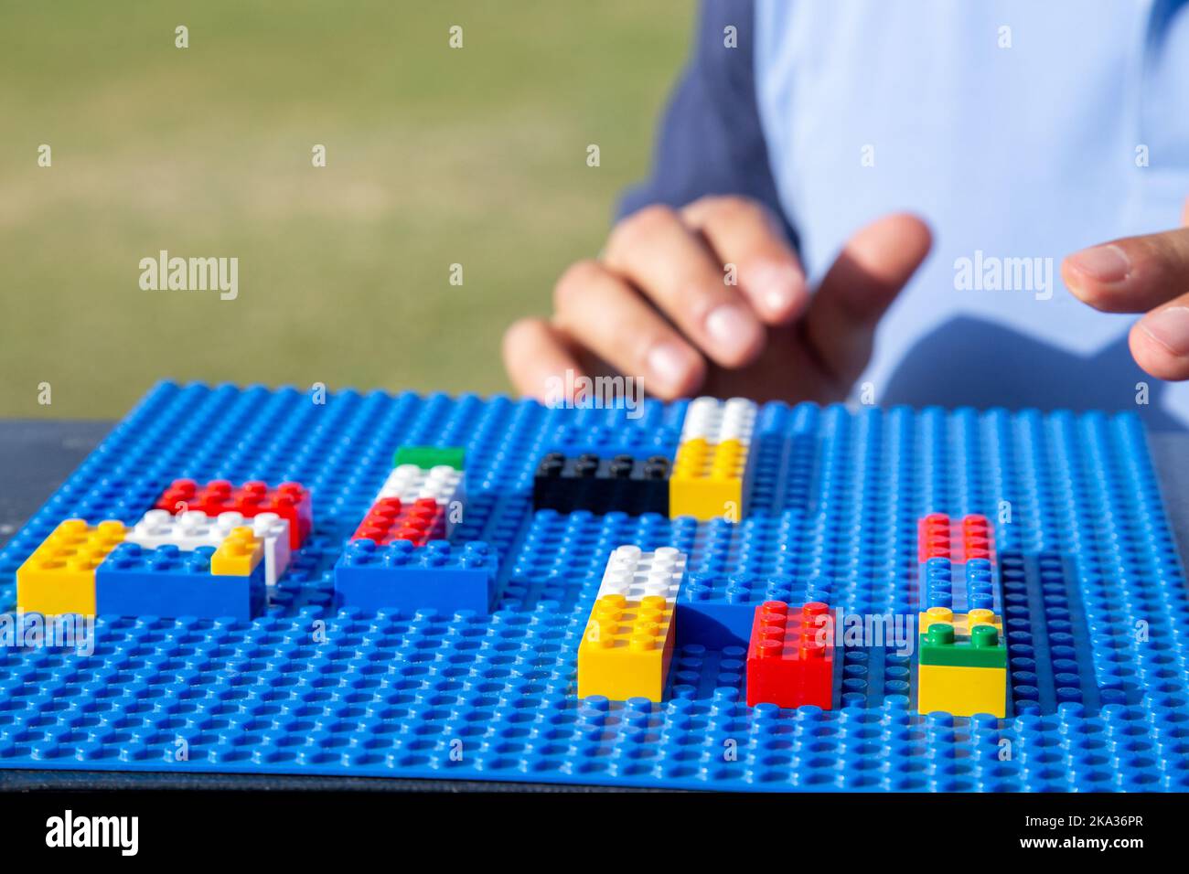 Child counting blocks hi-res stock photography and images - Alamy