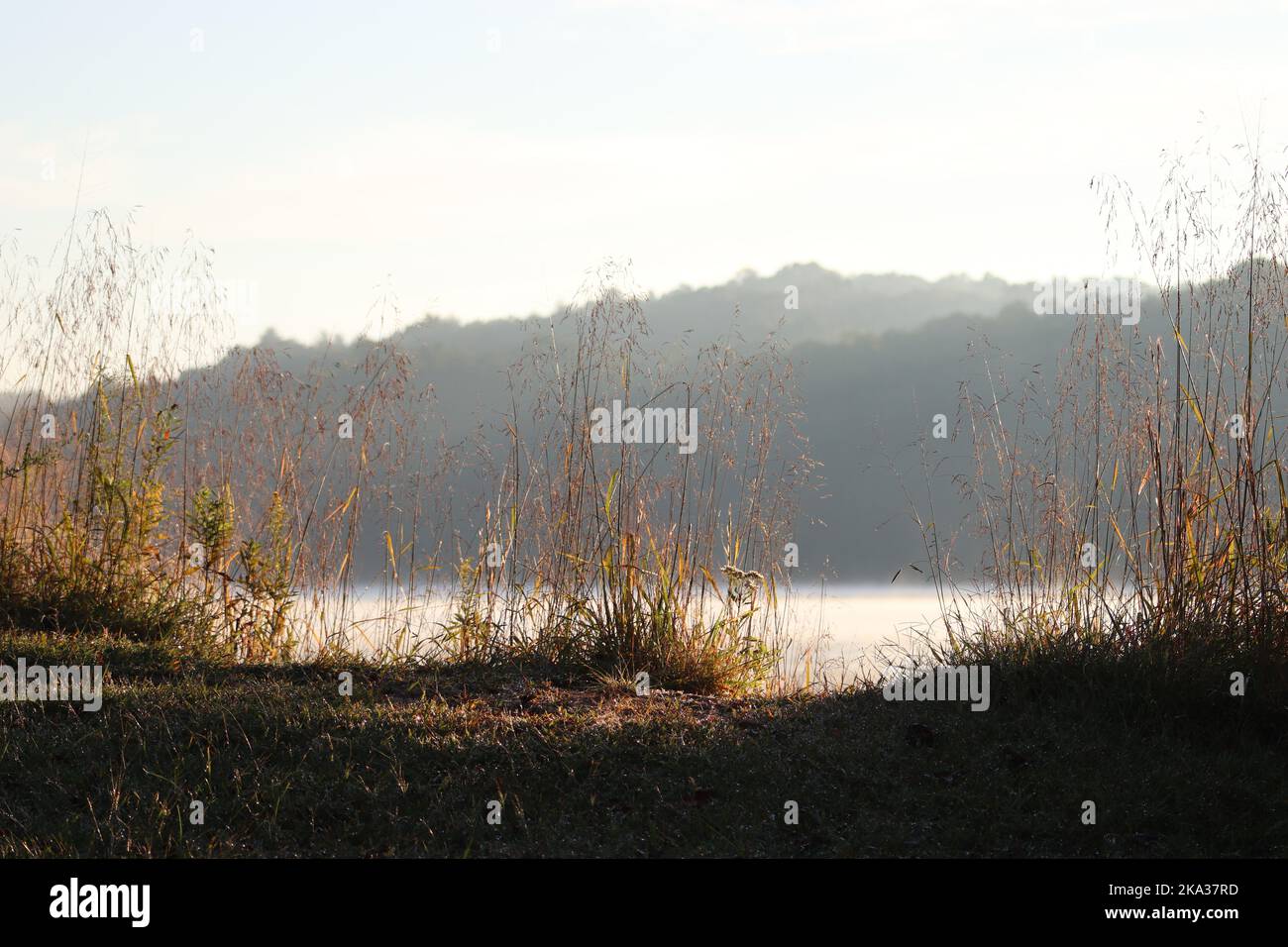 A natural scenery of the morning sun on the lake at the foot of the ...