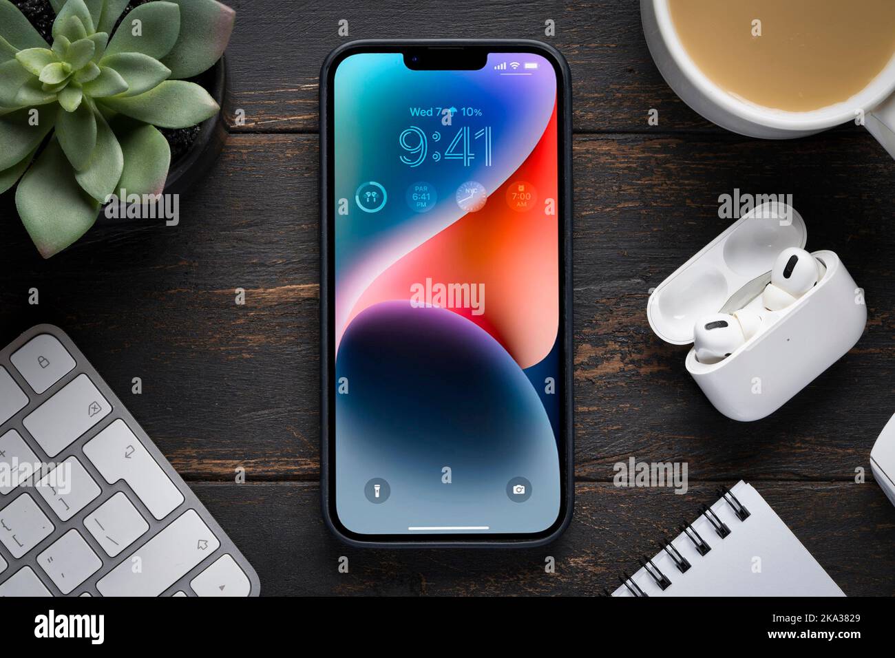 The new included Apple iPhone 14 pro max with original wallpaper on a ...