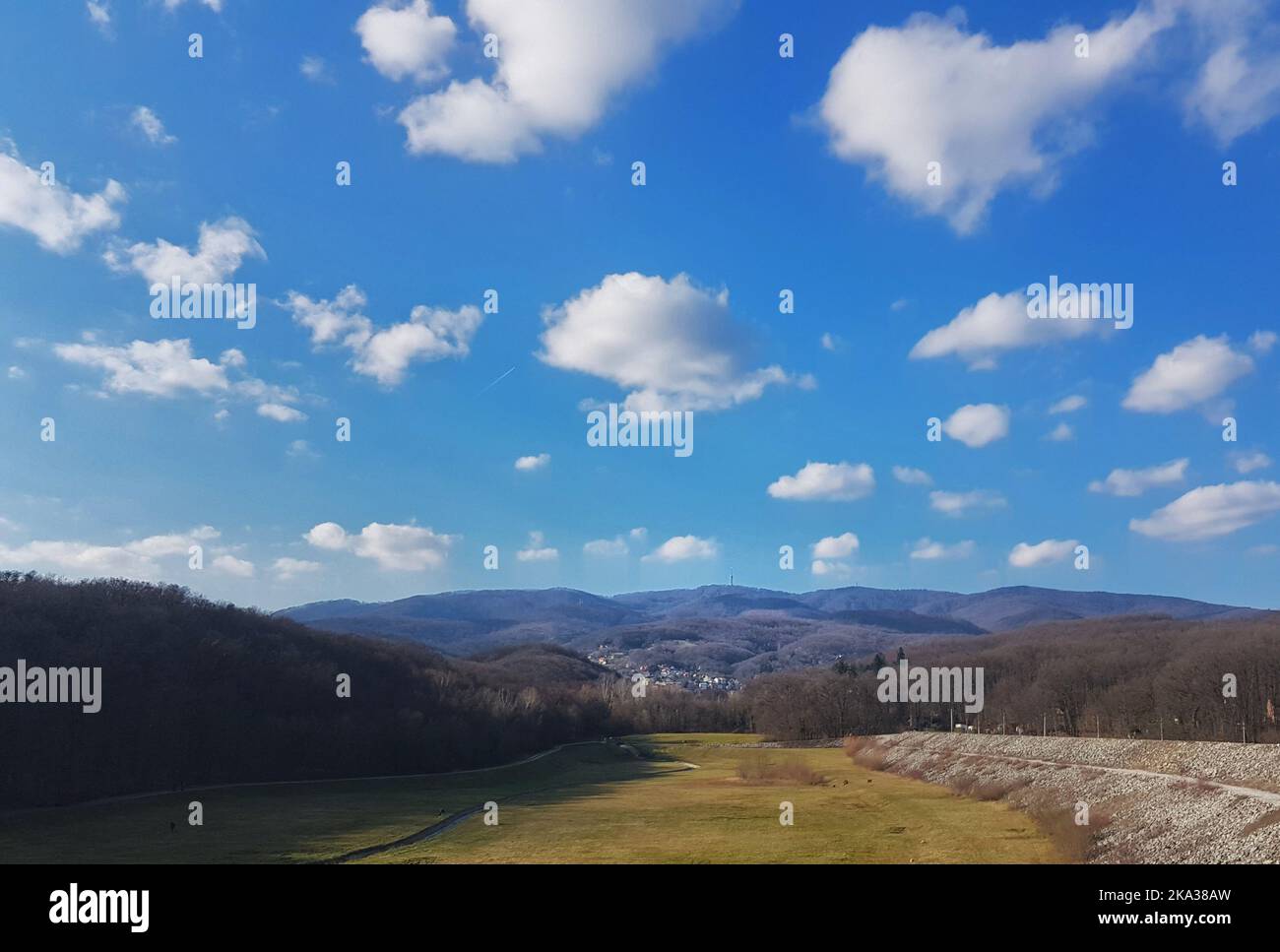 A low angle shot of beautiful mountains on a sunny day Stock Photo - Alamy