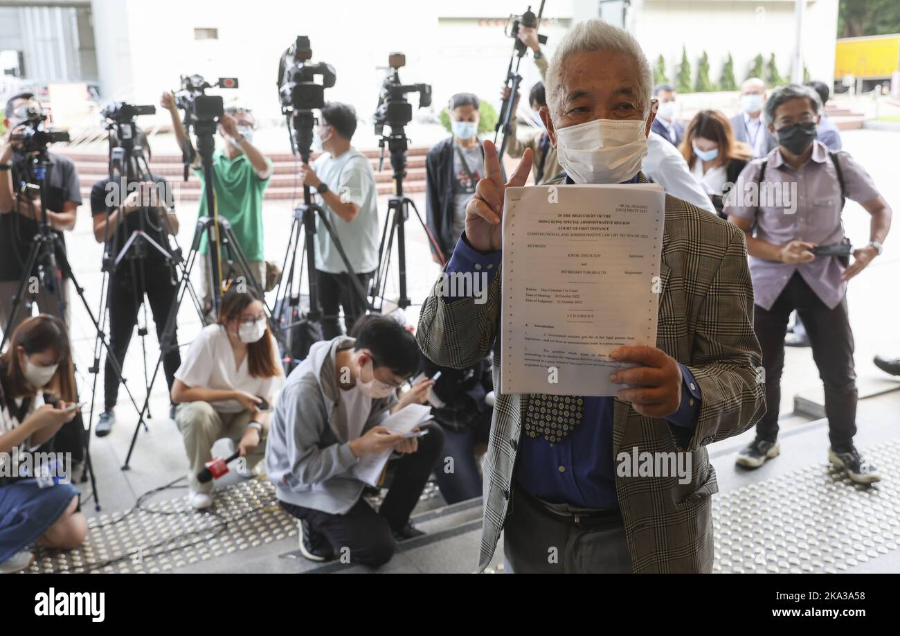 Retired civil servant Kwok Cheuk-kin met the press outside the High ...