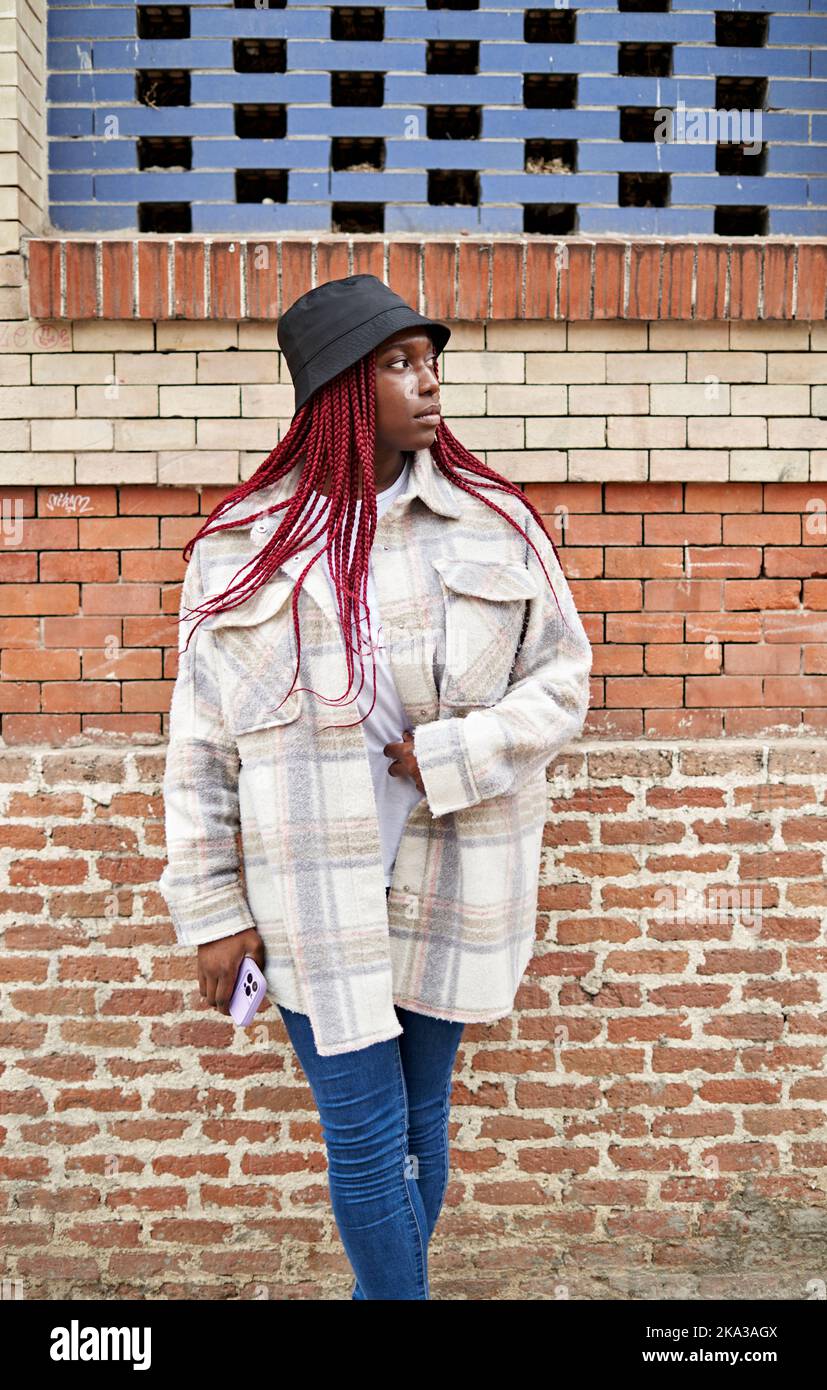 African American woman portraits With A Brick Wall On The Background ...