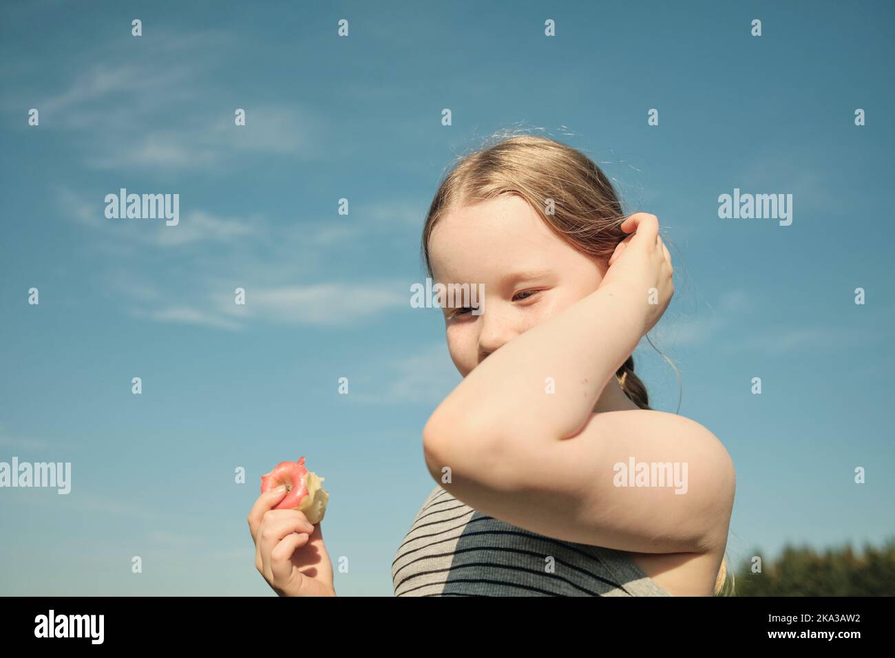 Kid girl eat apple hi-res stock photography and images - Alamy