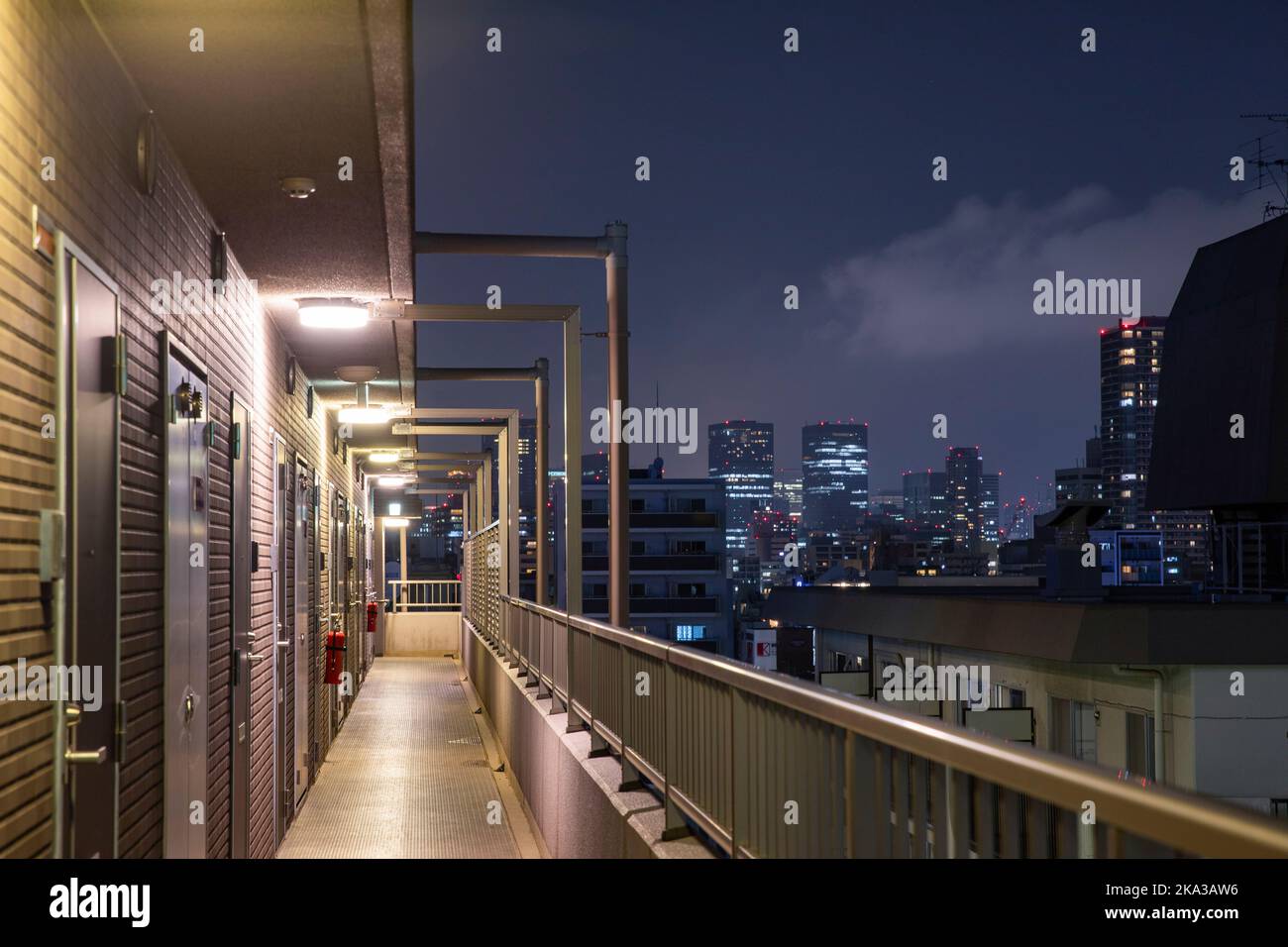 City night view of apartment corridor in Osaka, Japan Stock Photo - Alamy