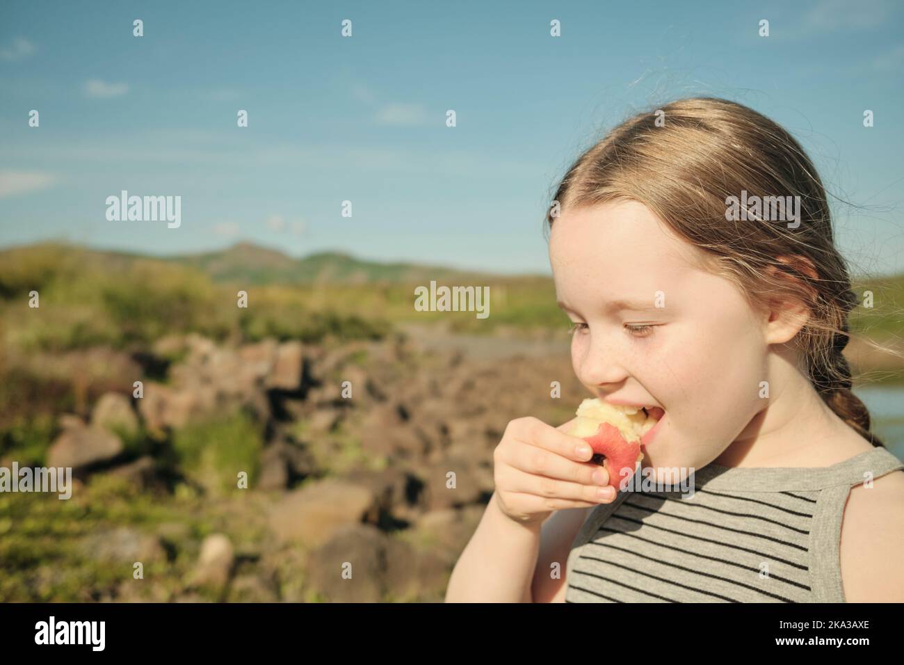 Kid girl eat apple hi-res stock photography and images - Alamy