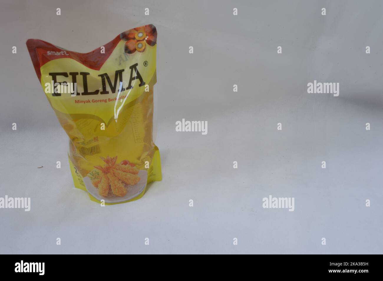 Filma packaged cooking oil on a white background Stock Photo - Alamy