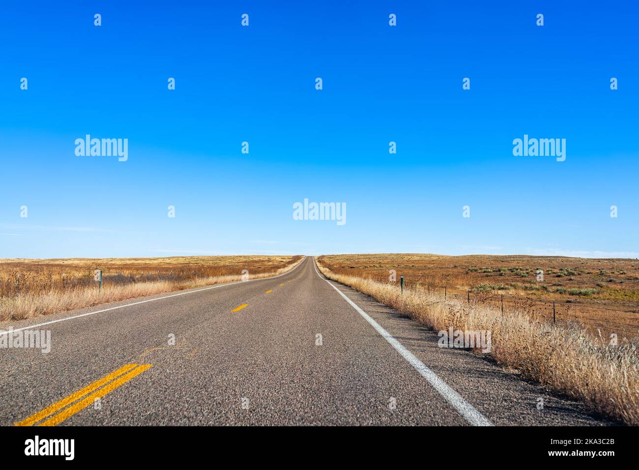 Road trip point of view near Wichita, Kansas rural countryside with ...