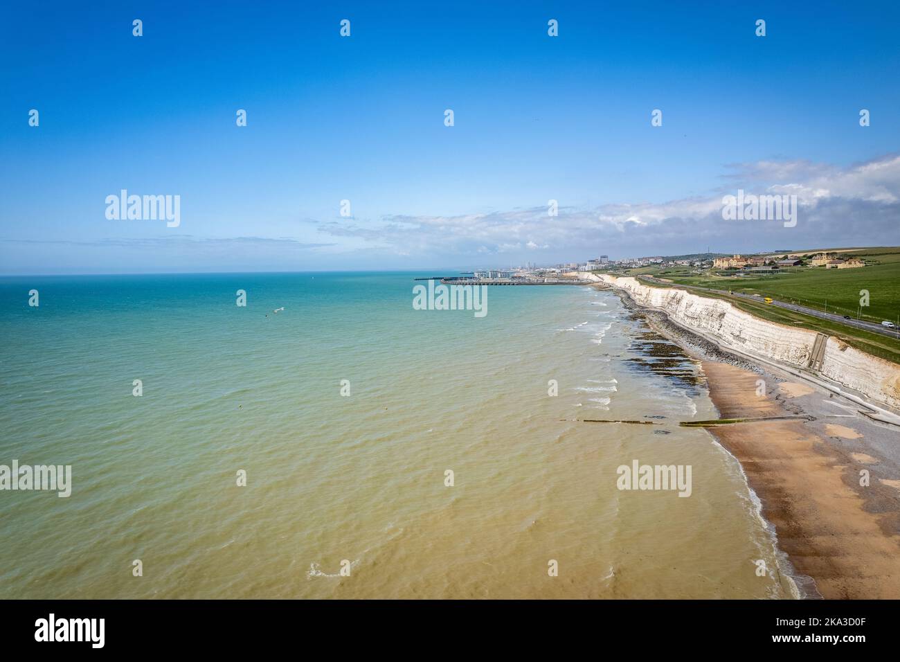 An aerial view of white chalk cliffs and the sea in Brighton, England ...