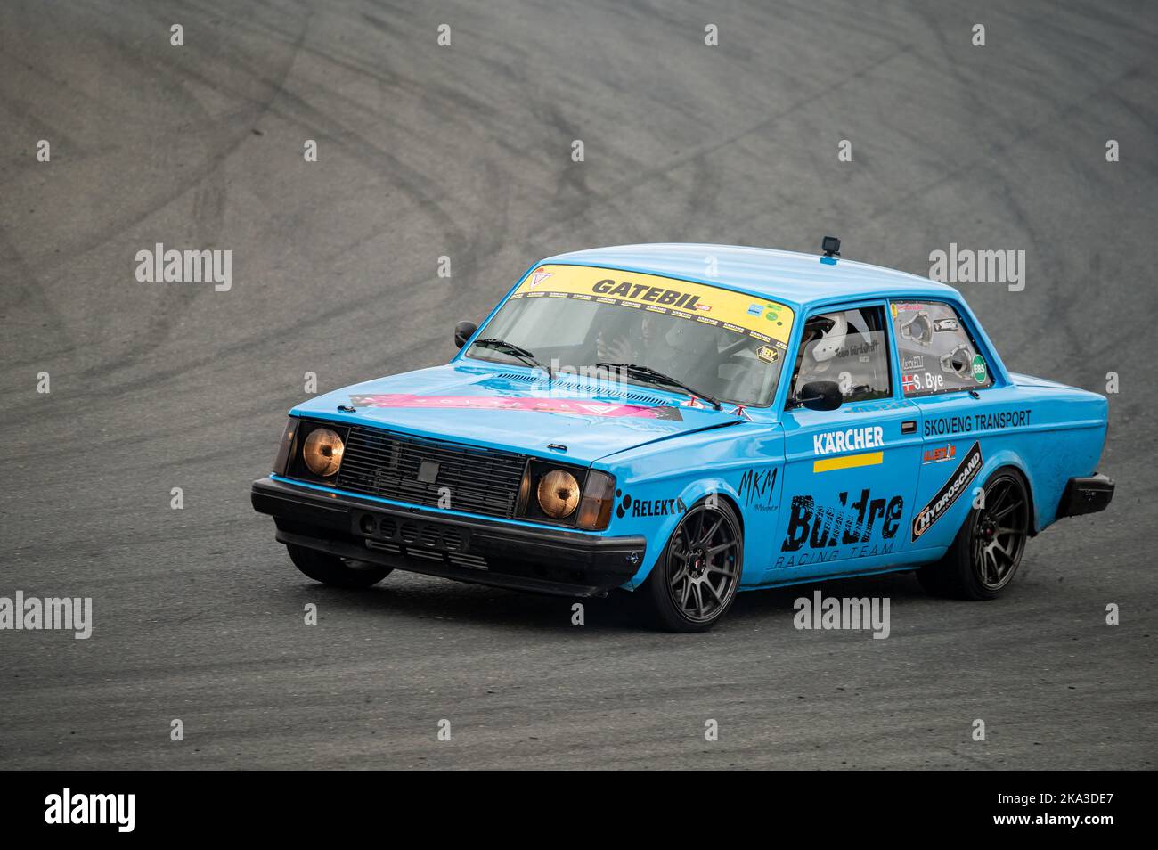 Volvo model 242 skidding on the race track Stock Photo - Alamy