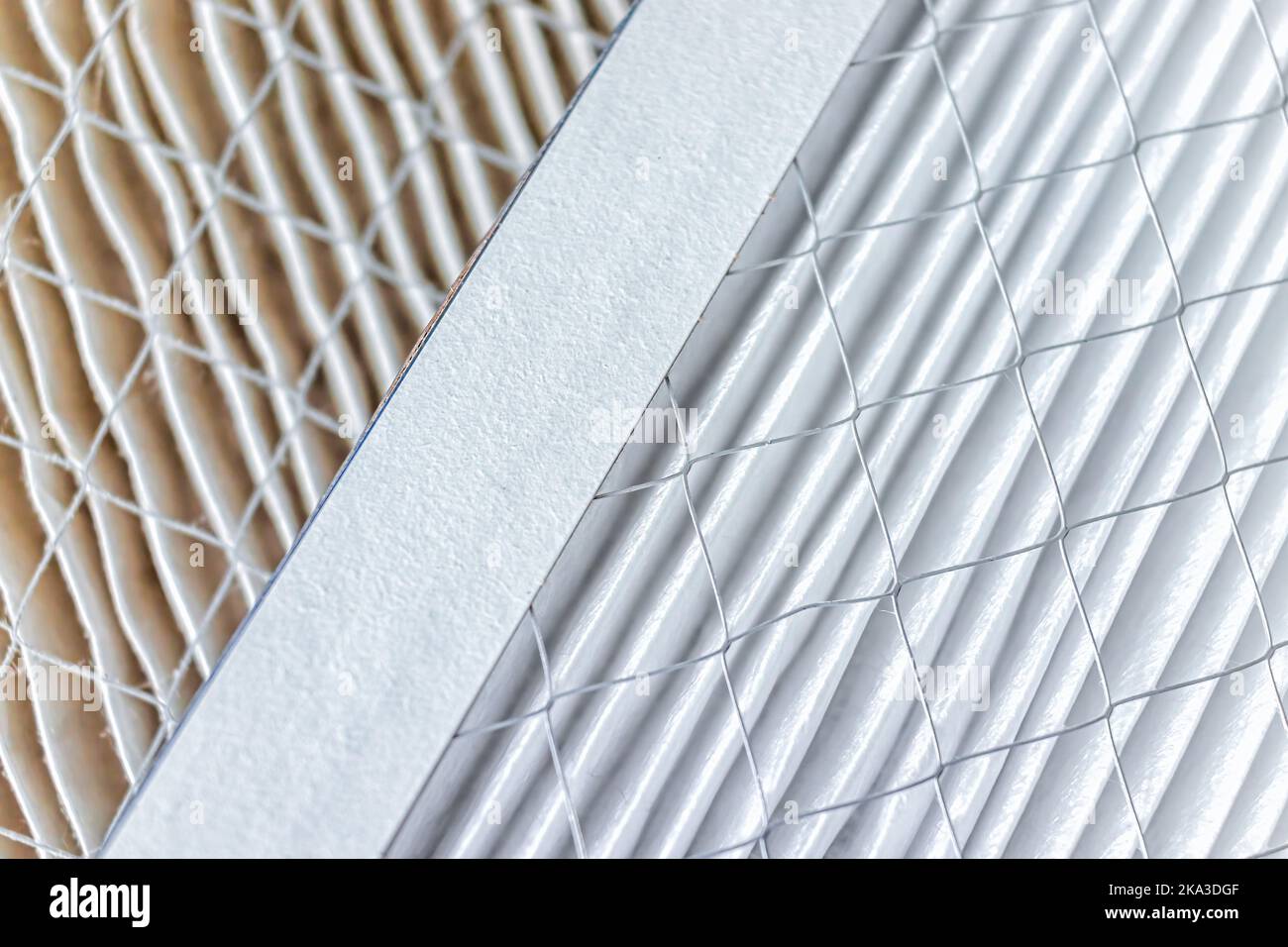 Macro closeup of side by side comparison of dirty and clean AC air ...