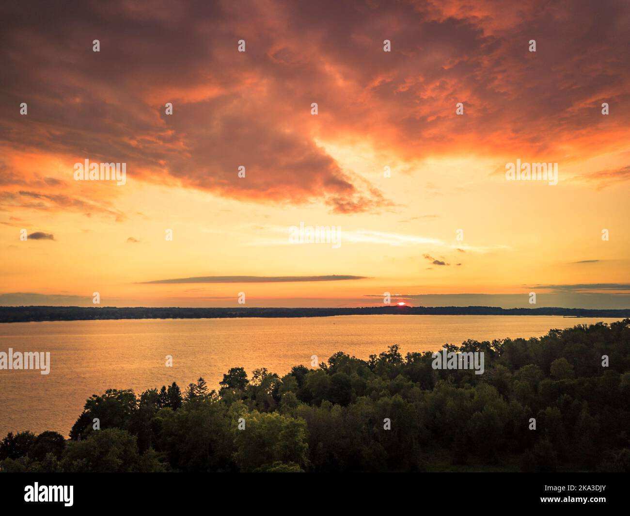 A bird's eye view of beautiful sunset on Owasco Lake in Auburn, New ...