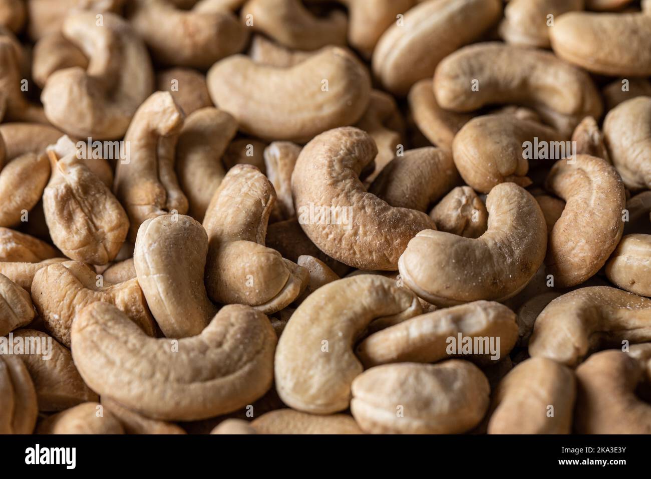 Full frame top view of huge amount of raw tasty cashews placed on ...