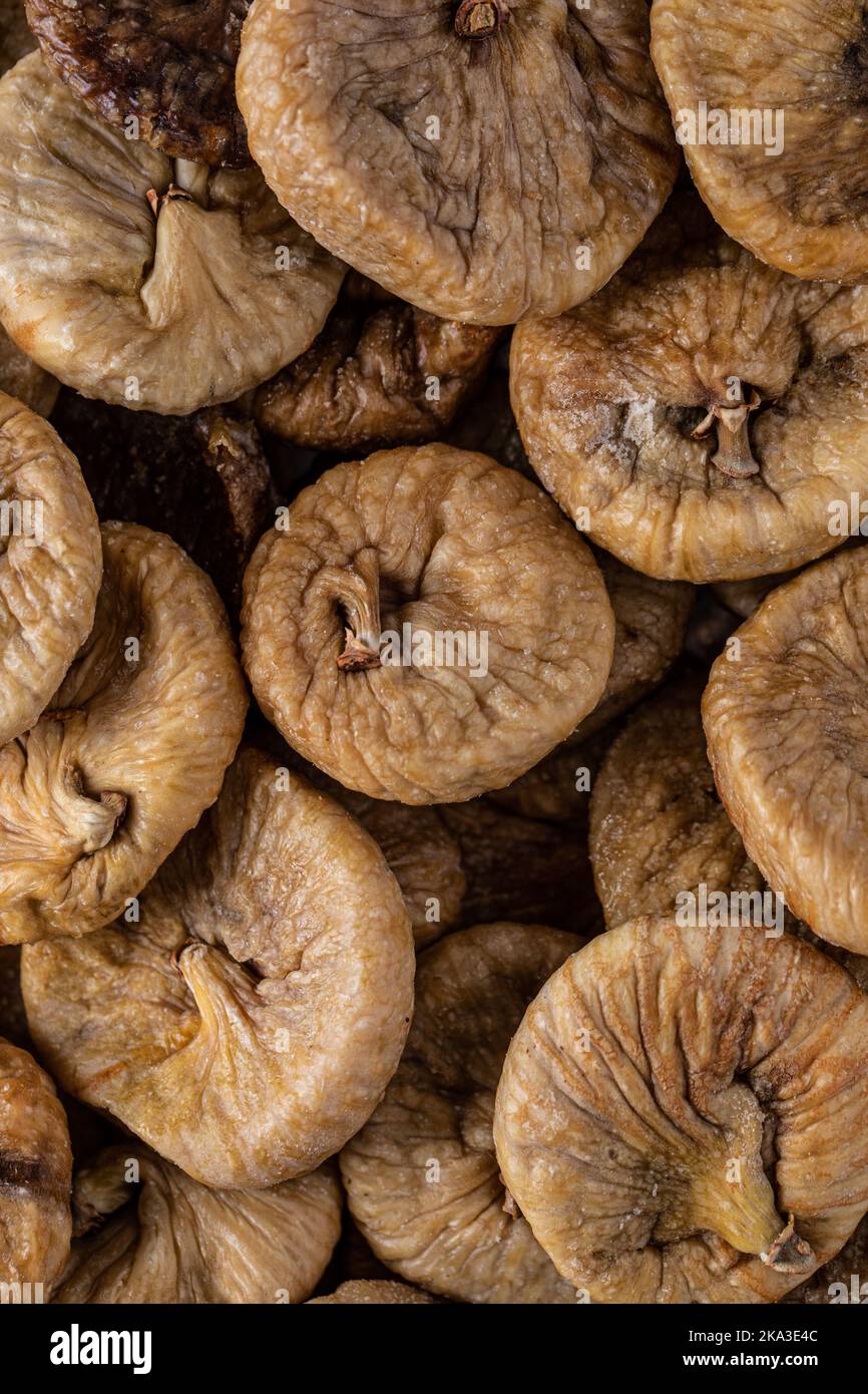 Full frame high angle of shrunken dehydrated Turkish figs stacked in ...