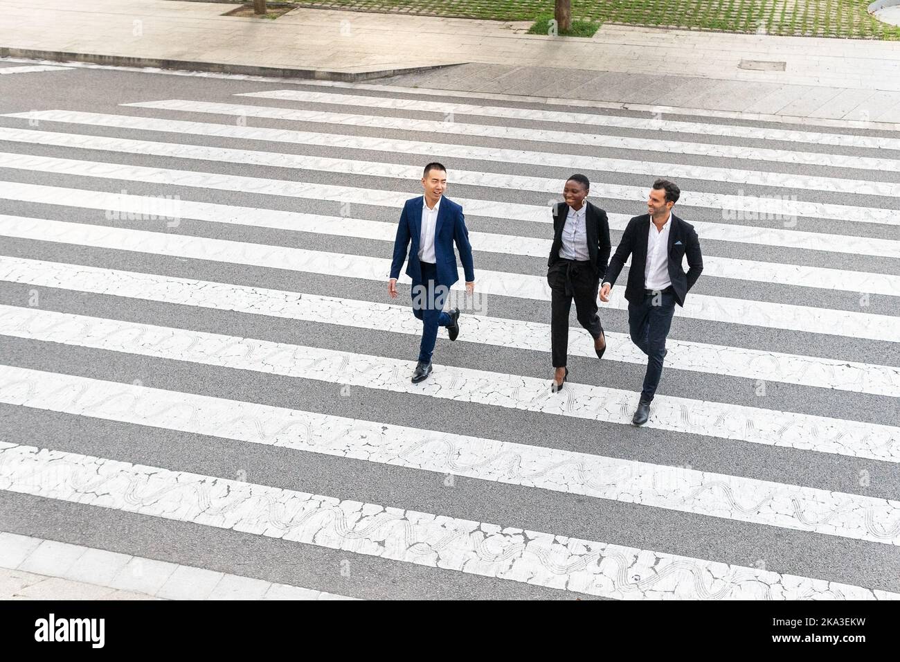 Diverse people on crosswalk above hi-res stock photography and images ...