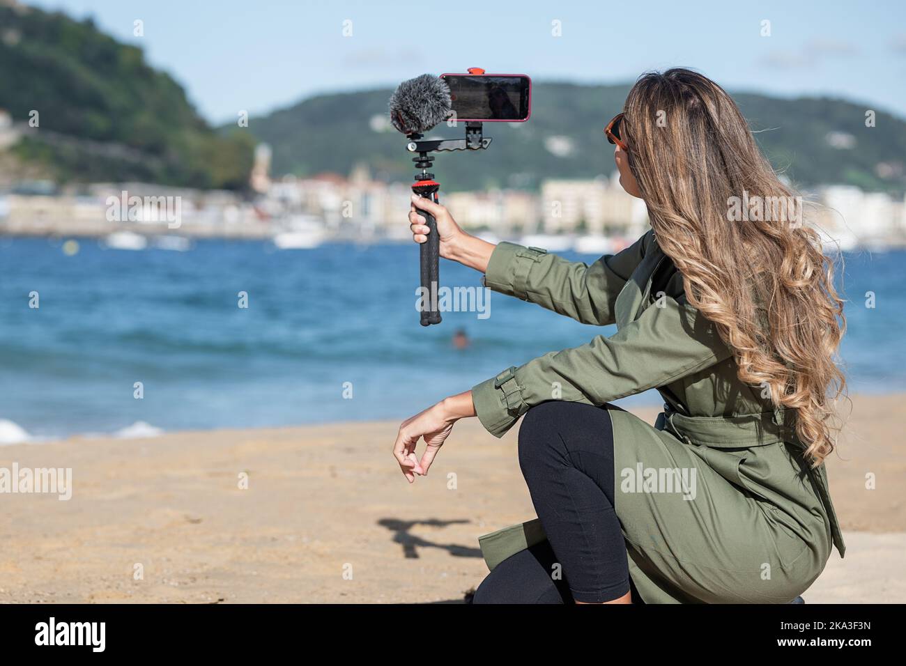 Woman in trench coat sea hi-res stock photography and images - Alamy