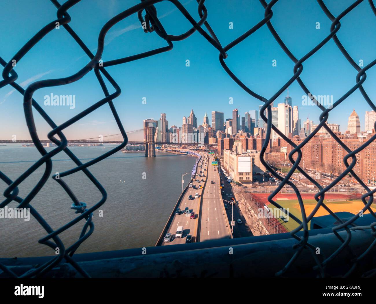 FDR Drive with cars located near Brooklyn Bridge on shore of East River ...