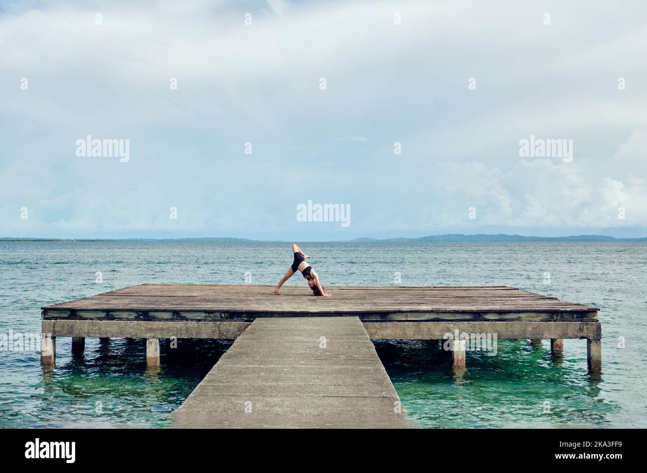 Three legged downward facing dog with hip opener hi-res stock photography and images - Alamy