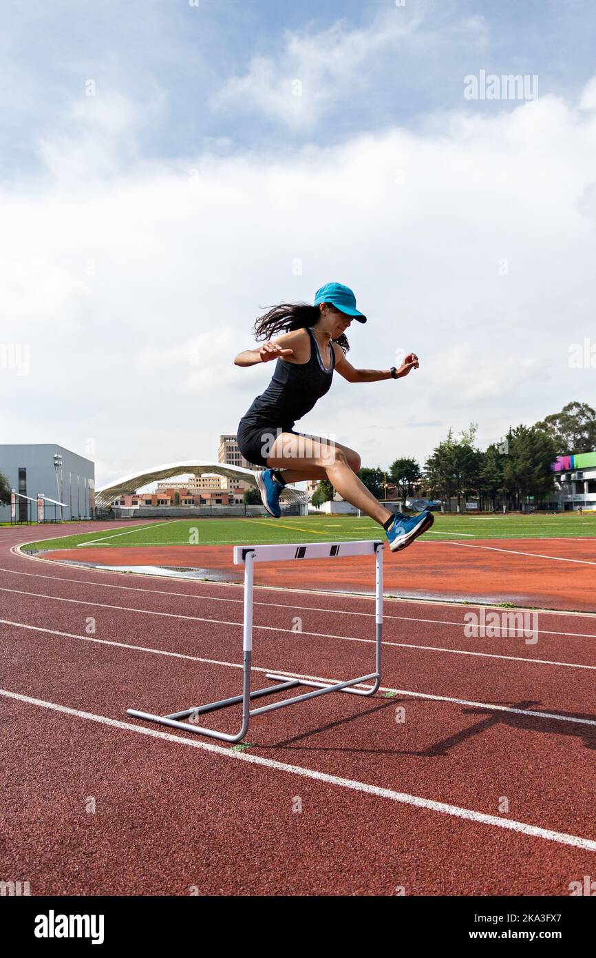 Athlete jump over barrier hi-res stock photography and images - Alamy