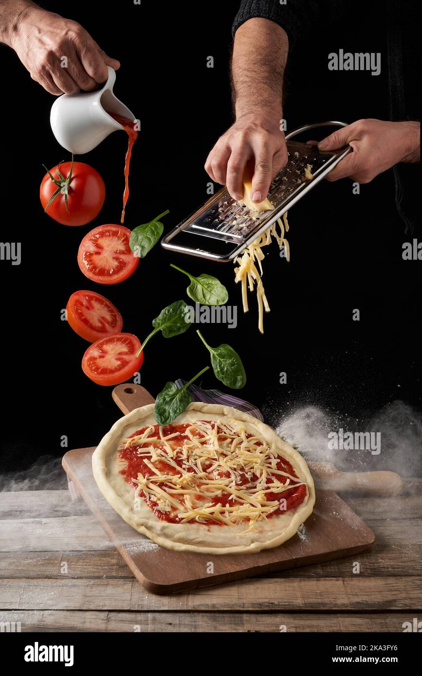 Grating cheese pizza hi-res stock photography and images - Alamy