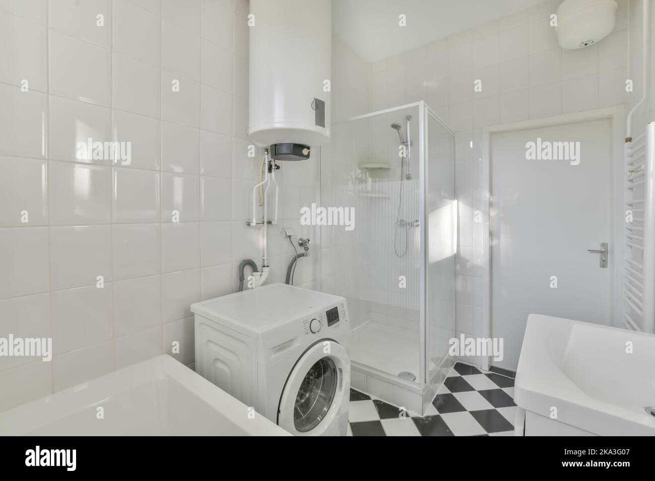 Interior of contemporary bathroom with basin under mirror hanging on ...