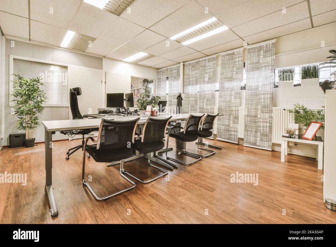 Interior of contemporary loft style office with comfortable chairs ...